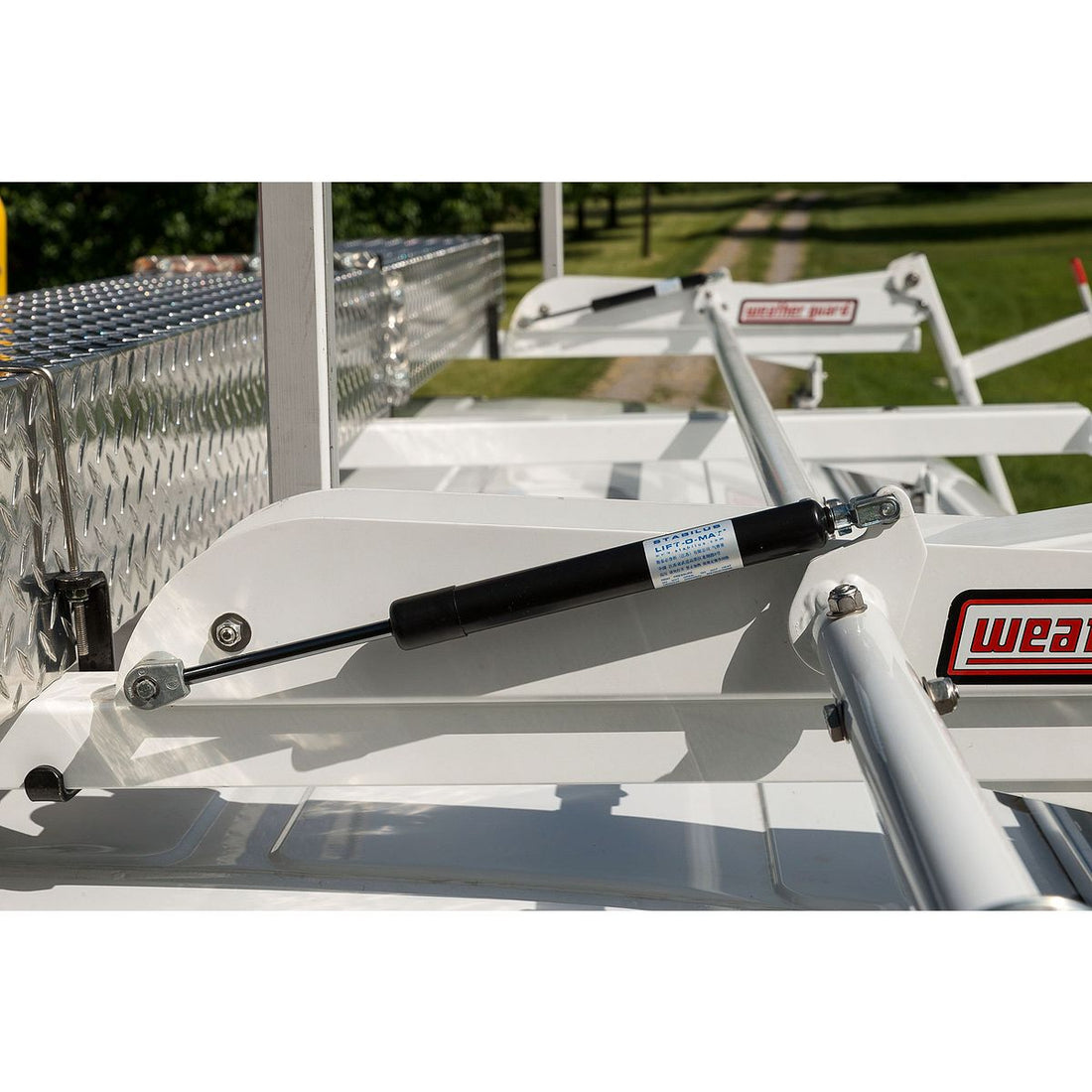 EZGLIDE2™ Drop-Down Ladder Rack for Transit, NV, Sprinter, ProMaster ...